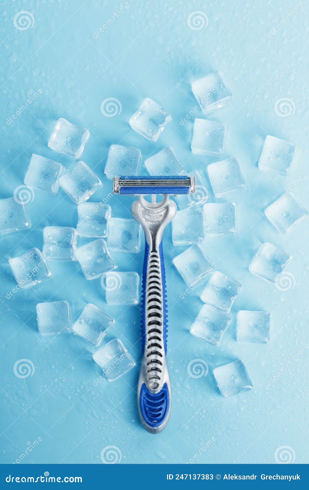 Blue Shaving Machine with Sharp Blades on the Background of Ice Cubes ...