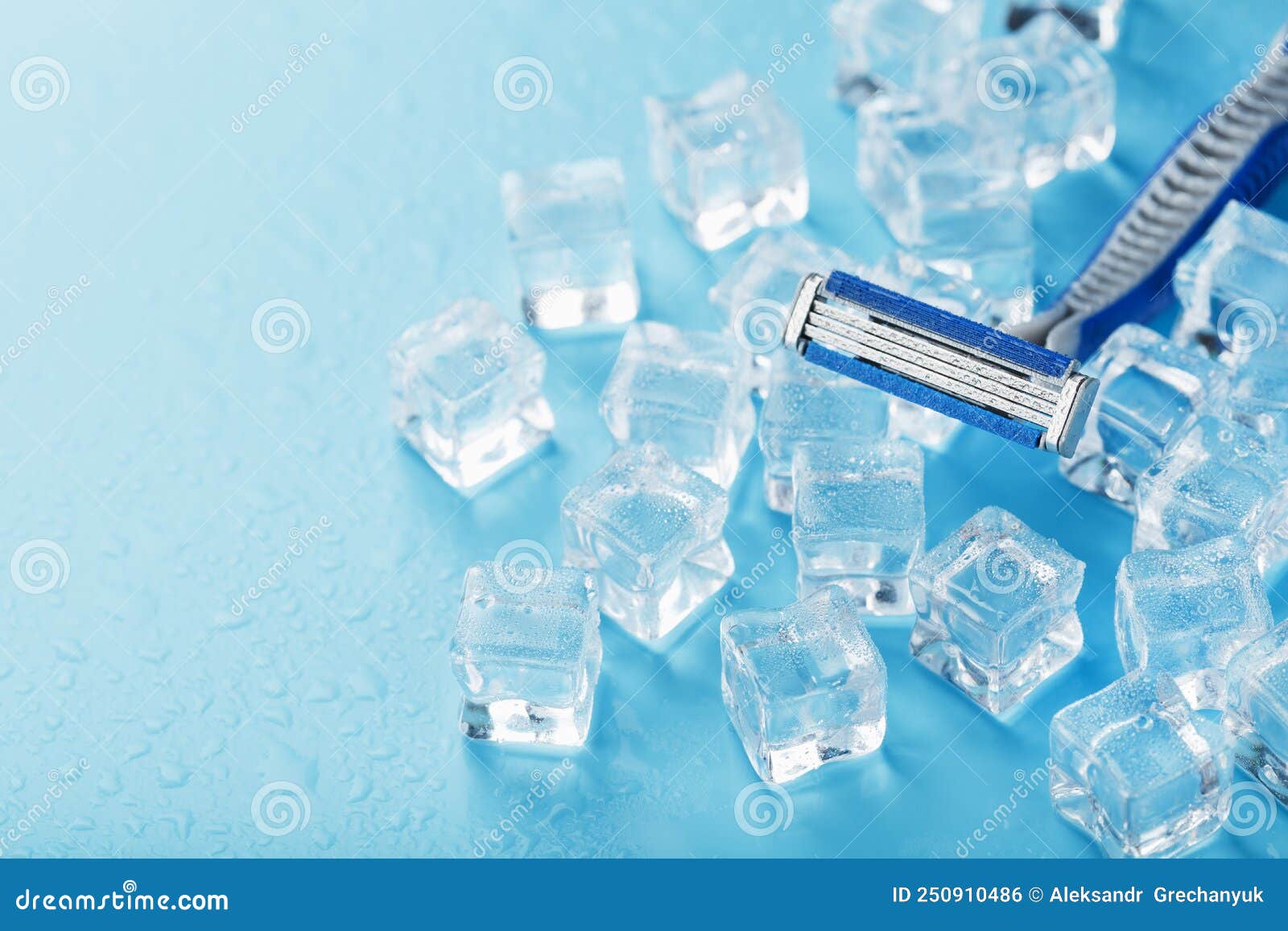 Blue Shaving Machine with Sharp Blades on the Background of Ice Cubes ...