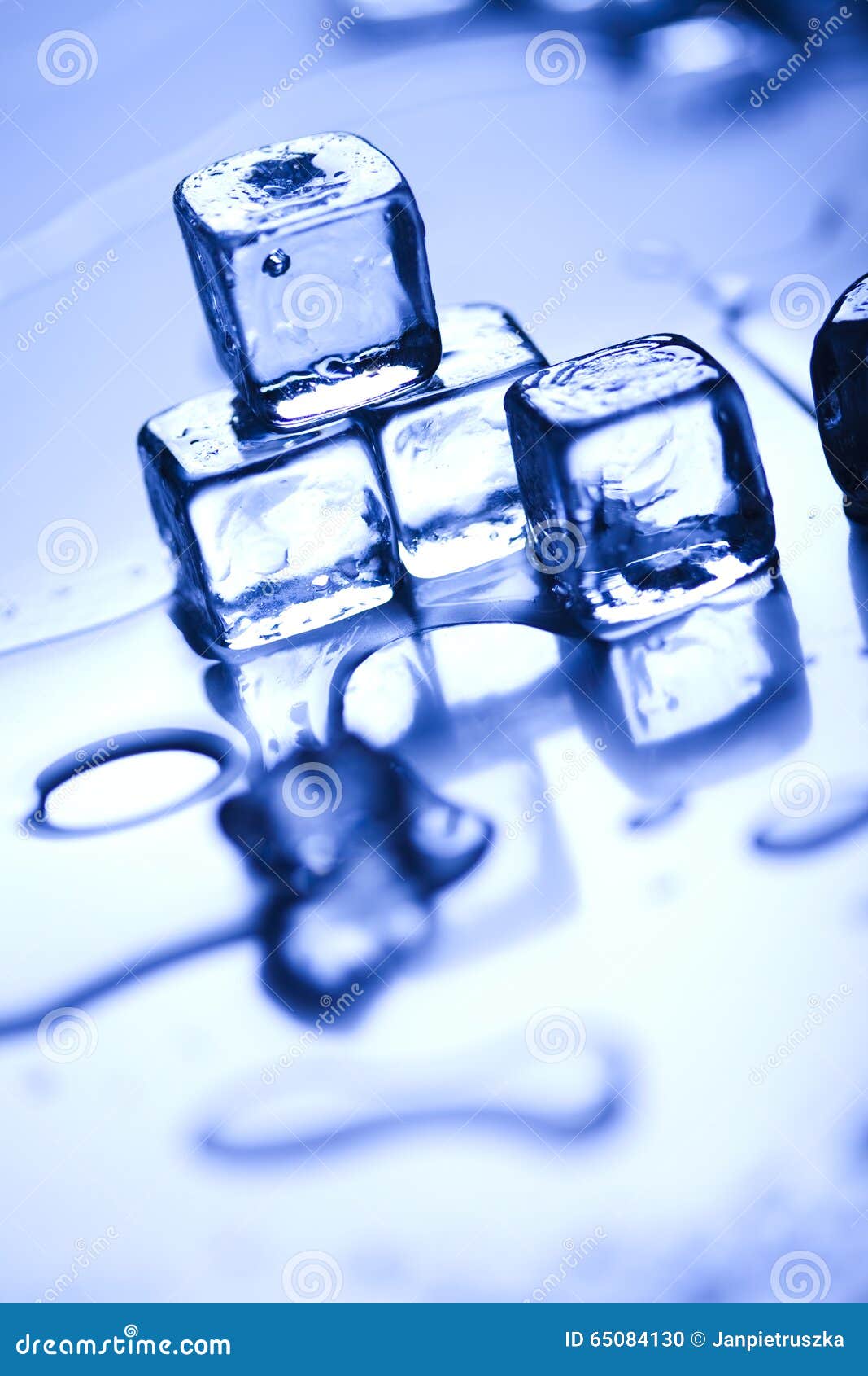 Blue and shiny ice cubes stock photo. Image of drink - 65084130