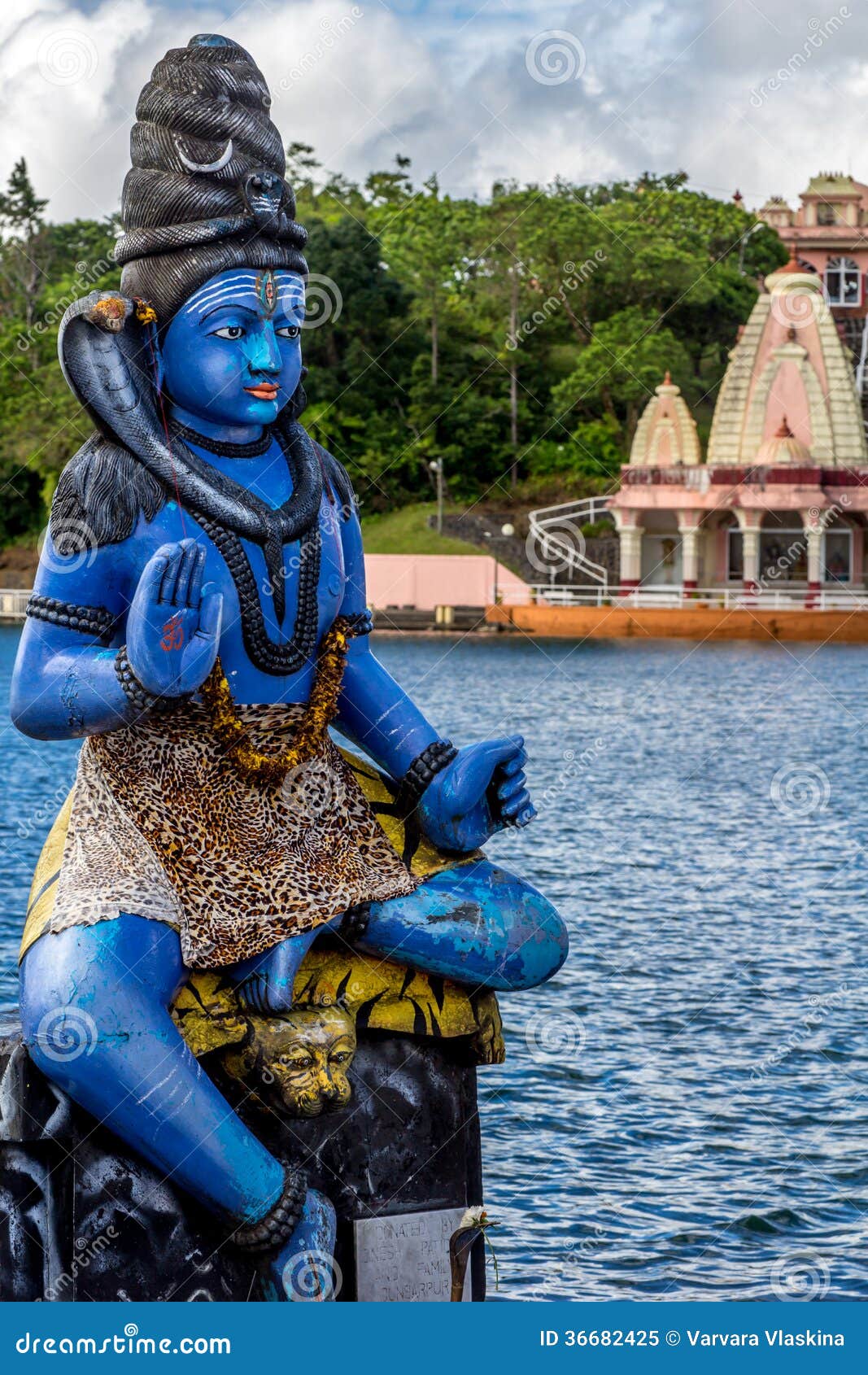 Blue Shiva Statue and a Temple Stock Image - Image of coin, cobra: 36682425