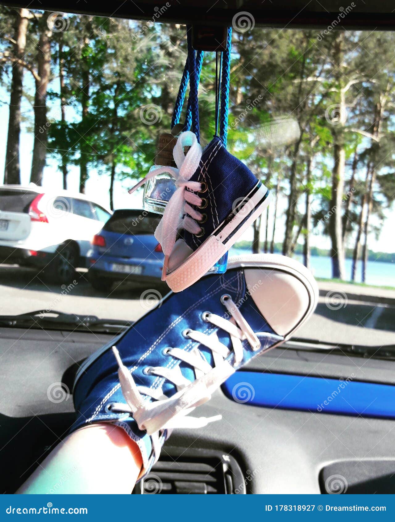 Blue shoes at the car stock image. Image of person, water - 178318927