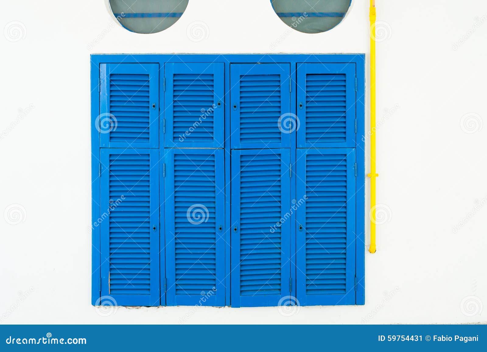 Blue Shutter Window and Yellow Tube on White Wall Stock Image - Image ...