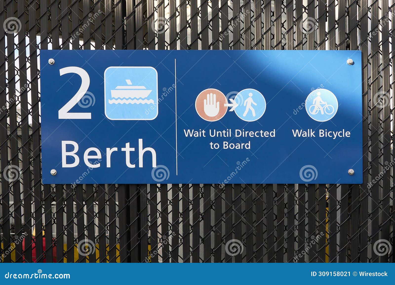 Blue Sign for Berth 2 Providing Passenger Information at a Ferry ...