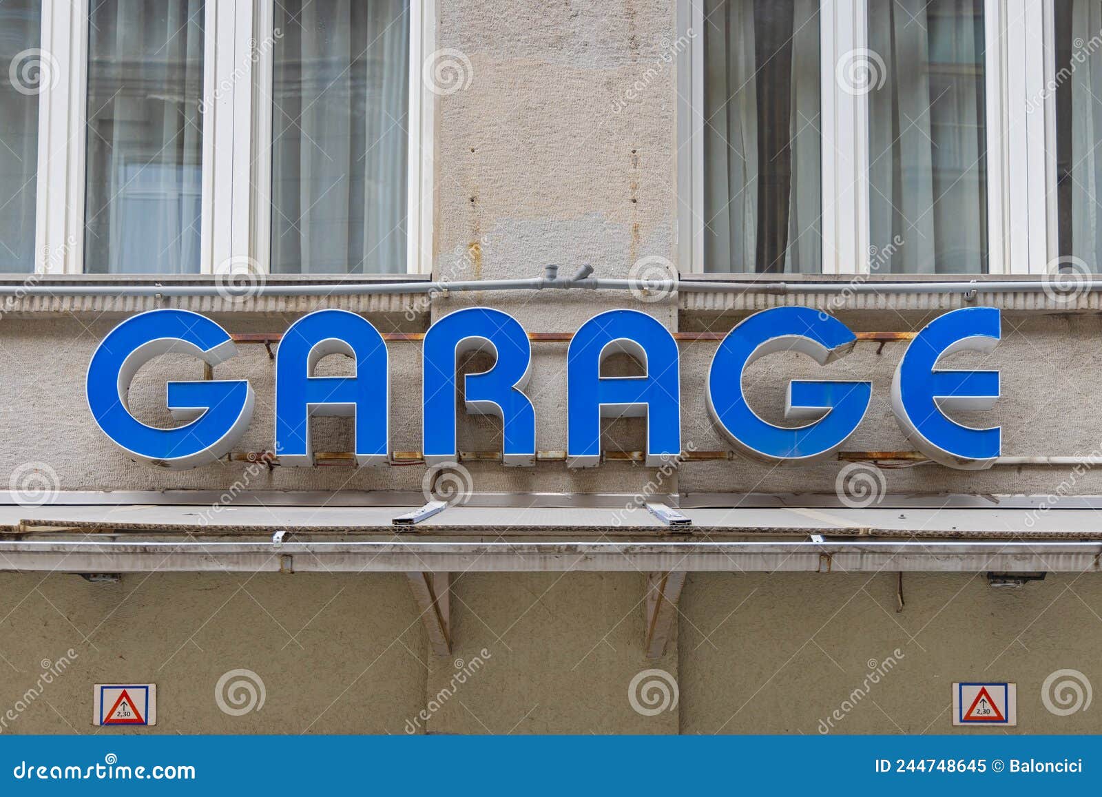 Blue Sign Garage stock image. Image of garage, structure - 244748645
