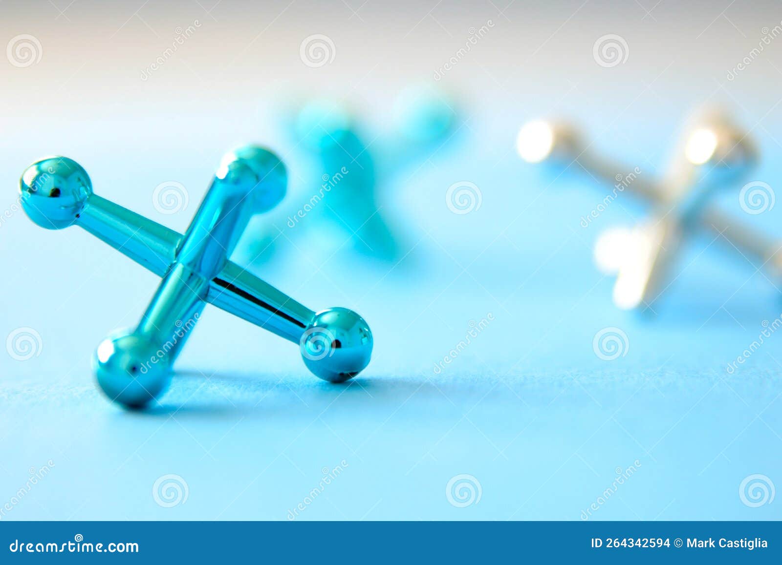 Blue and Silver Jacks in Macro View with Limited Focus Stock Photo ...