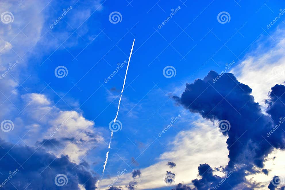 Blue Skies and the Trace of a Passing Plane Stock Image - Image of ...