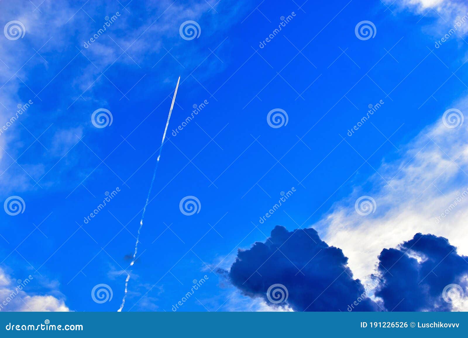 Blue Skies and the Trace of a Passing Plane Stock Photo - Image of ...