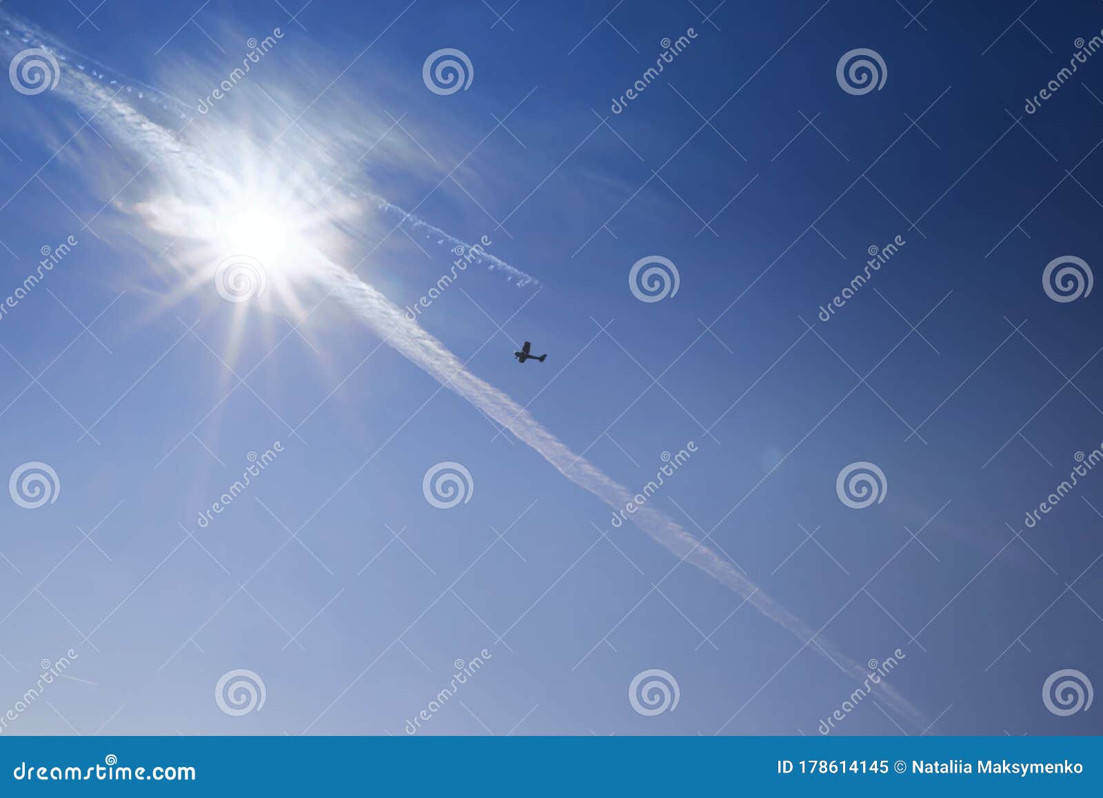 Blue Sky . Against the Background of Blue Sky and Bright Sun, an ...