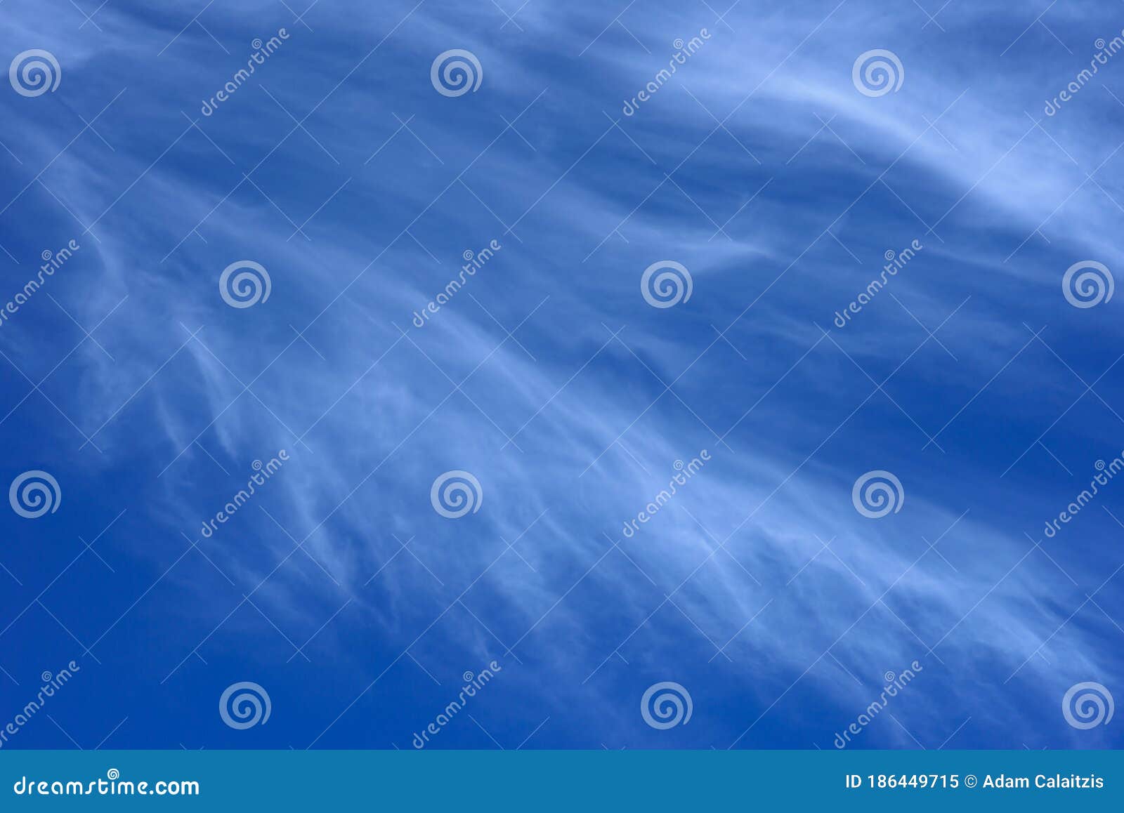 Blue Sky wispy clouds stock image. Image of beautiful - 186449715