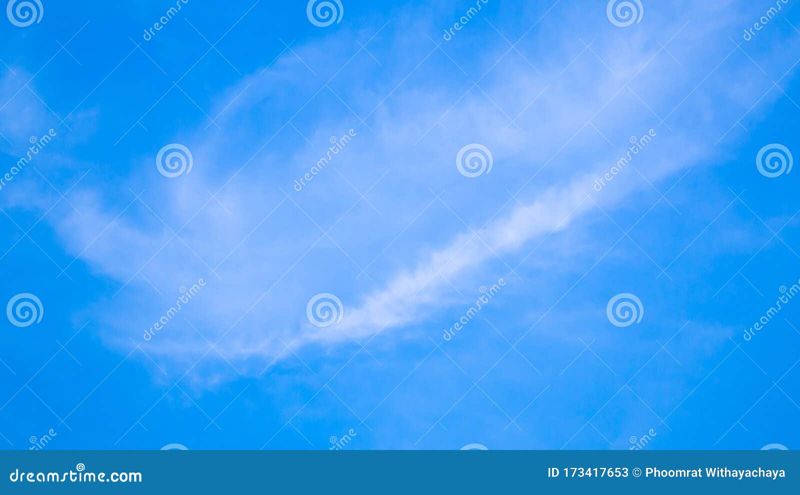 A Blue Sky with Beautiful Wisp of Cloud for Use As a Backing or ...