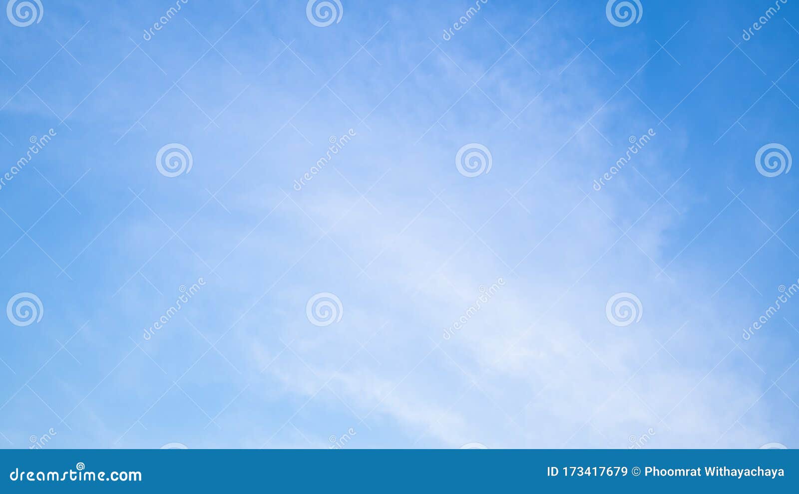 A Blue Sky with Beautiful Wisp of Cloud for Use As a Backing or ...