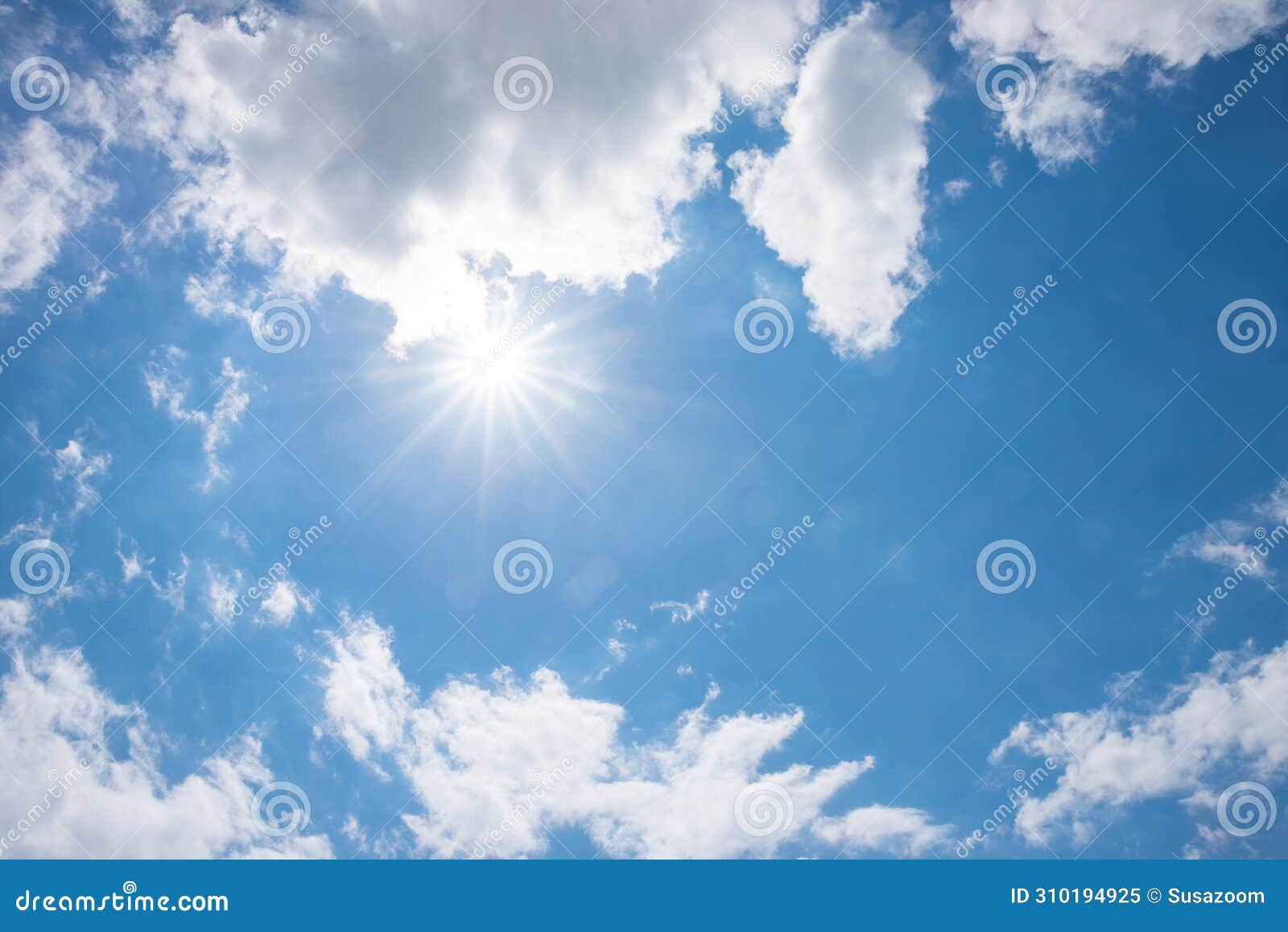 Blue Sky with Bright Sun and Rays, White Cumulus Clouds Around Stock ...