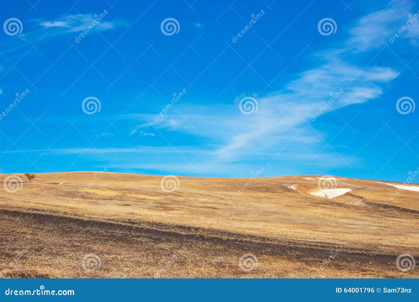 Blue sky, brown slope stock photo. Image of freedom, high - 64001796