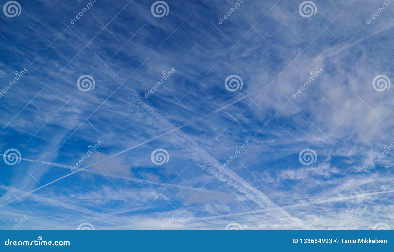 Blue Sky with Contrails and Clouds Stock Image - Image of colour ...