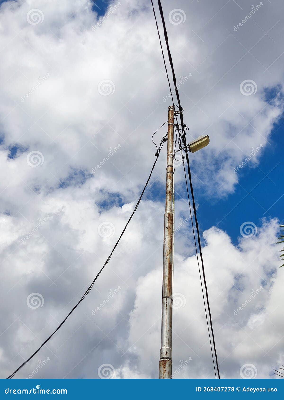 Electric Pole on a Sunny and Cloudy Day? Stock Photo - Image of line ...