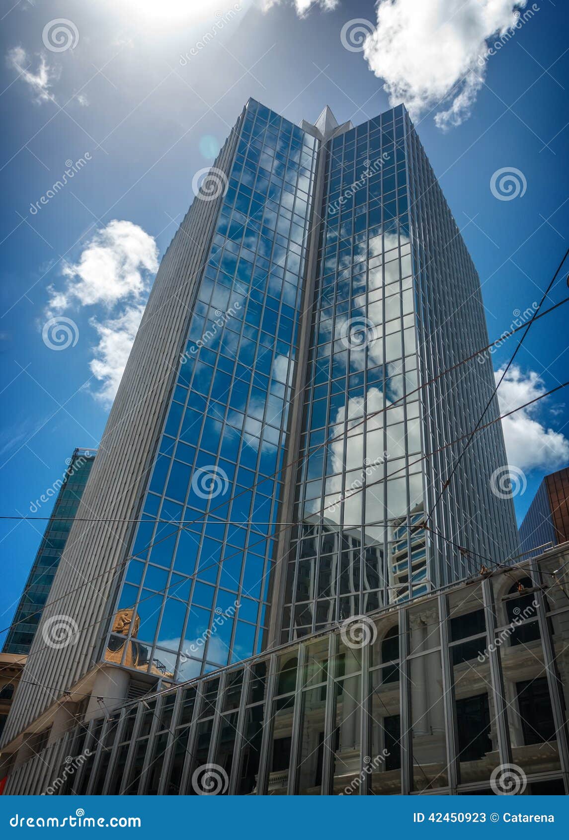 Blue Sky and Clouds Reflecting on a Building Stock Image - Image of ...