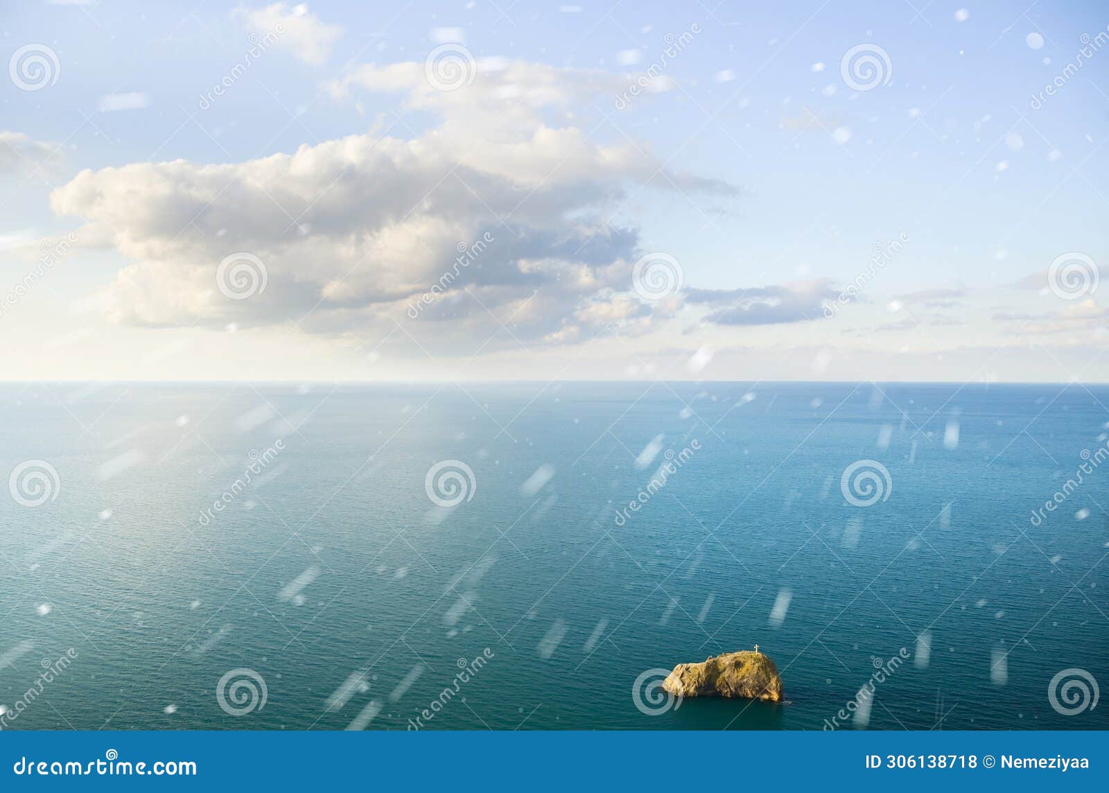 Blue Sky with Clouds and Snowfall Over Sea Stock Photo - Image of ...