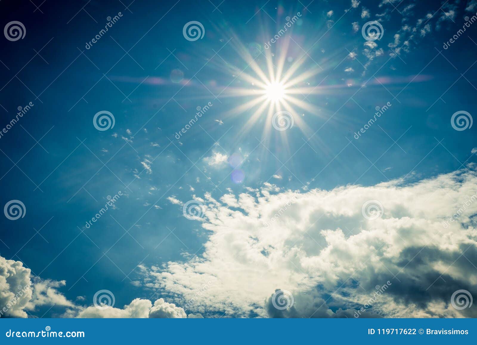 Blue Sky with Clouds and Sun Reflection. Sun Shines Bright in the ...