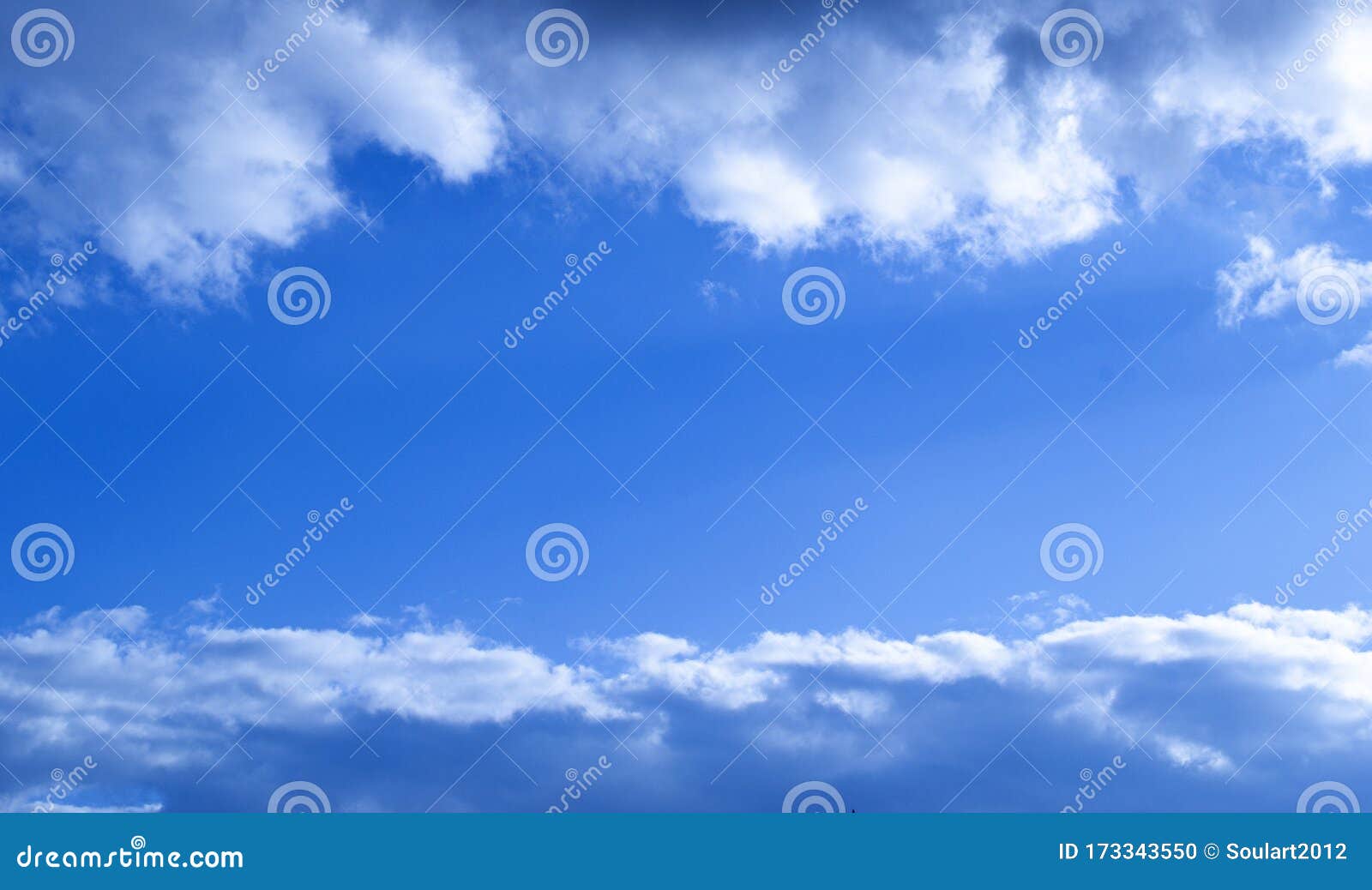 Blue Sky with Clouds on the Top and the Bottom of the Composition and ...