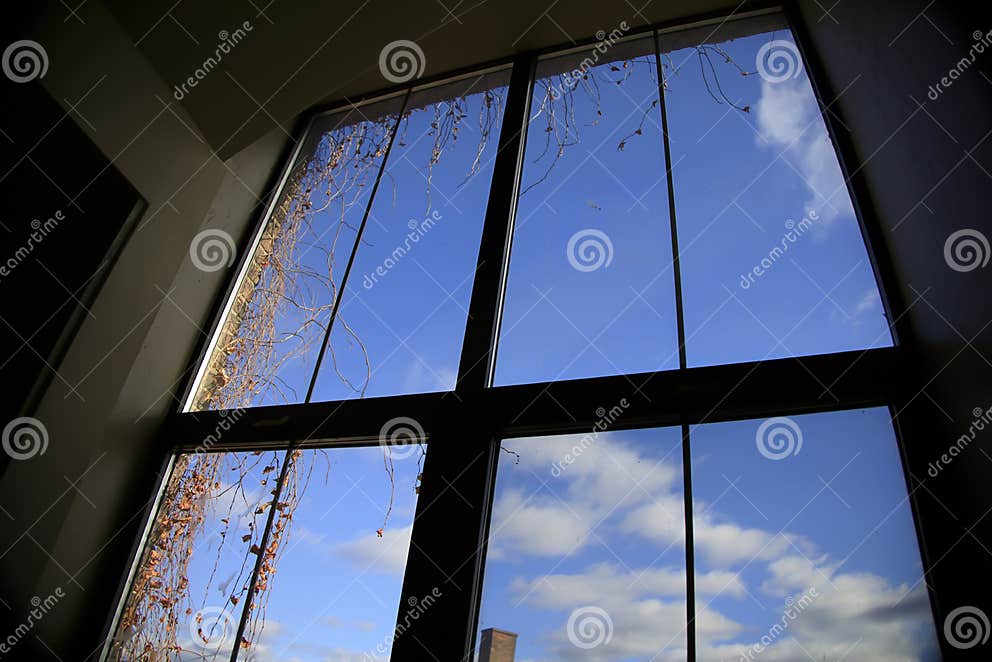 Blue Sky and Clouds through a Window of a Building Stock Photo - Image ...