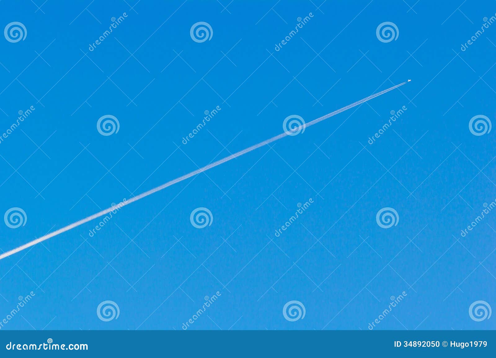 Blue sky with contrail stock photo. Image of space, line - 34892050
