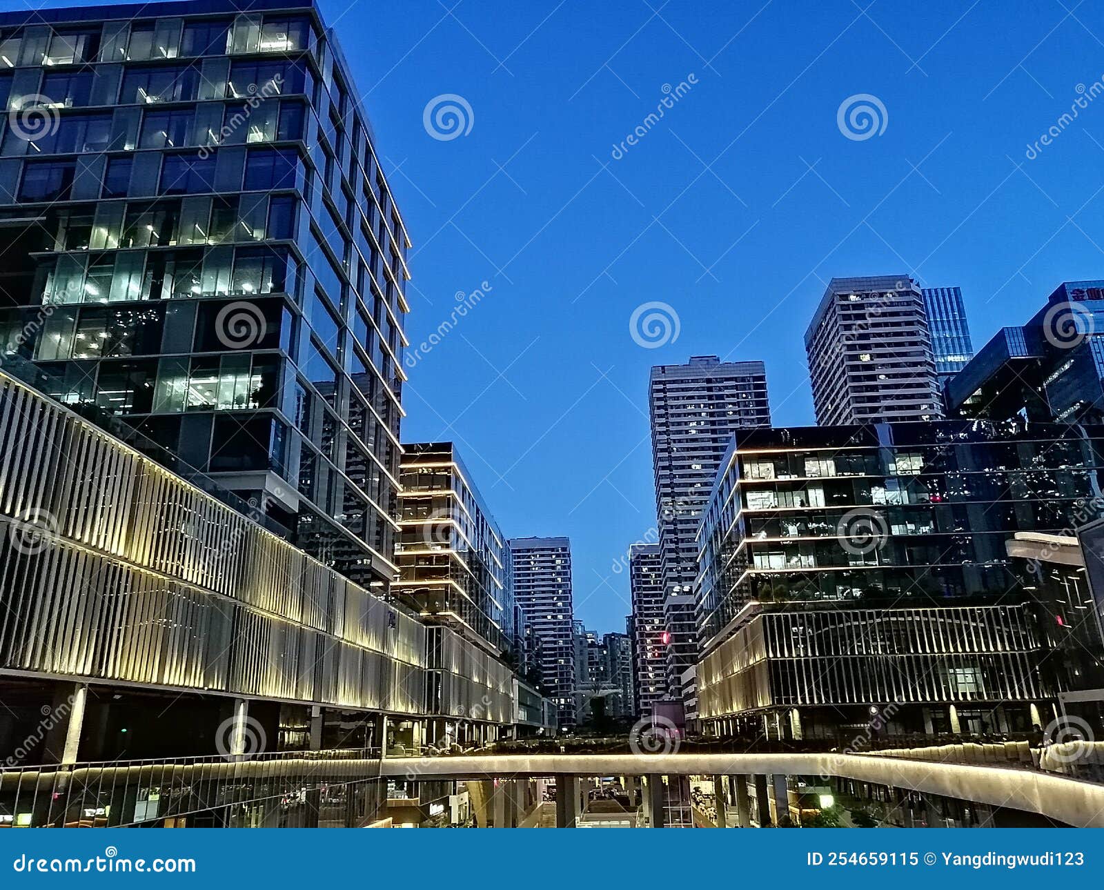 The Blue Sky in the Evening and the Brightly Lit Metropolis Complement ...