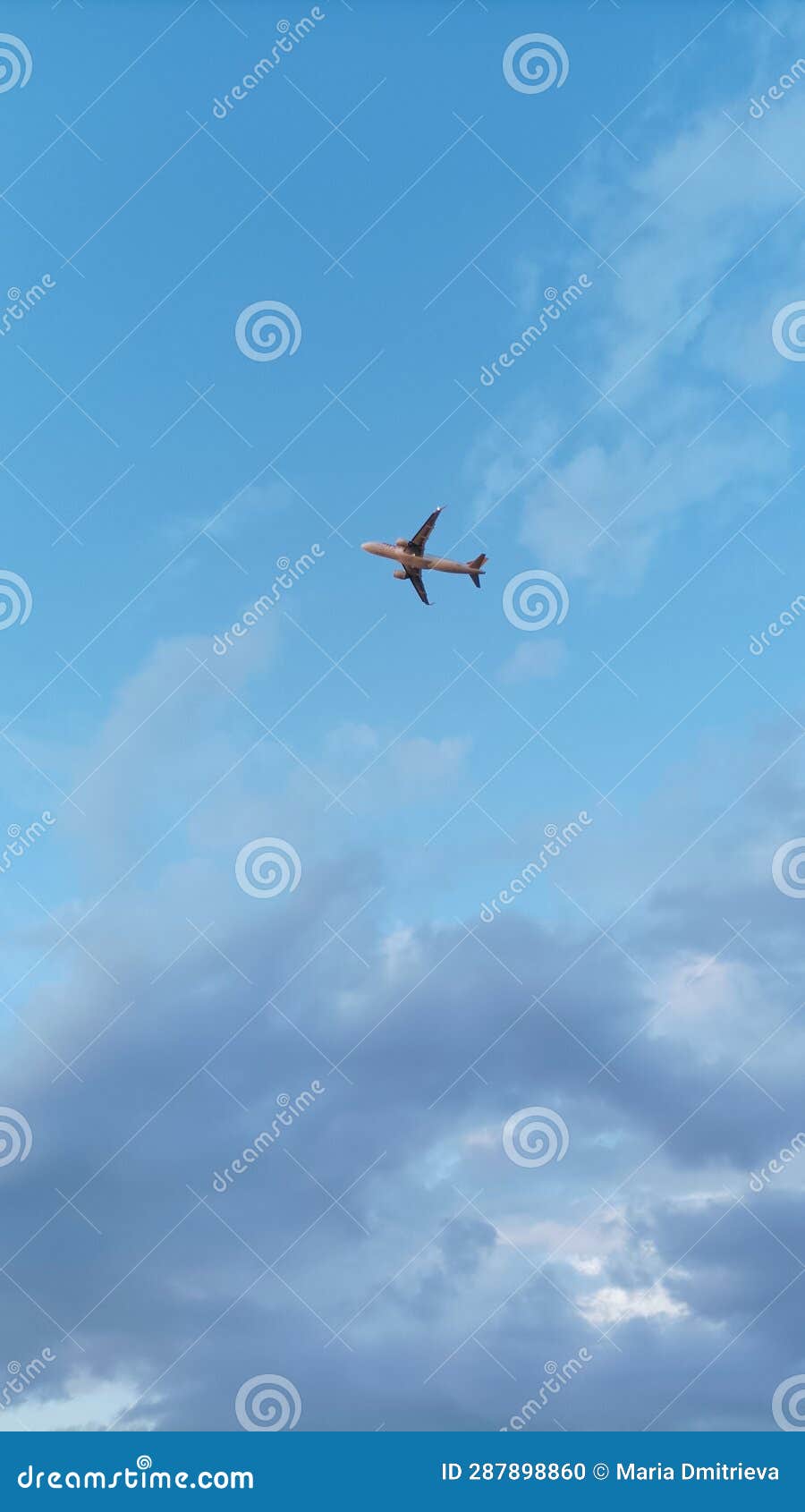 Blue Sky, Light Clouds, a Plane Flying. Vertical Photo Stock Photo ...