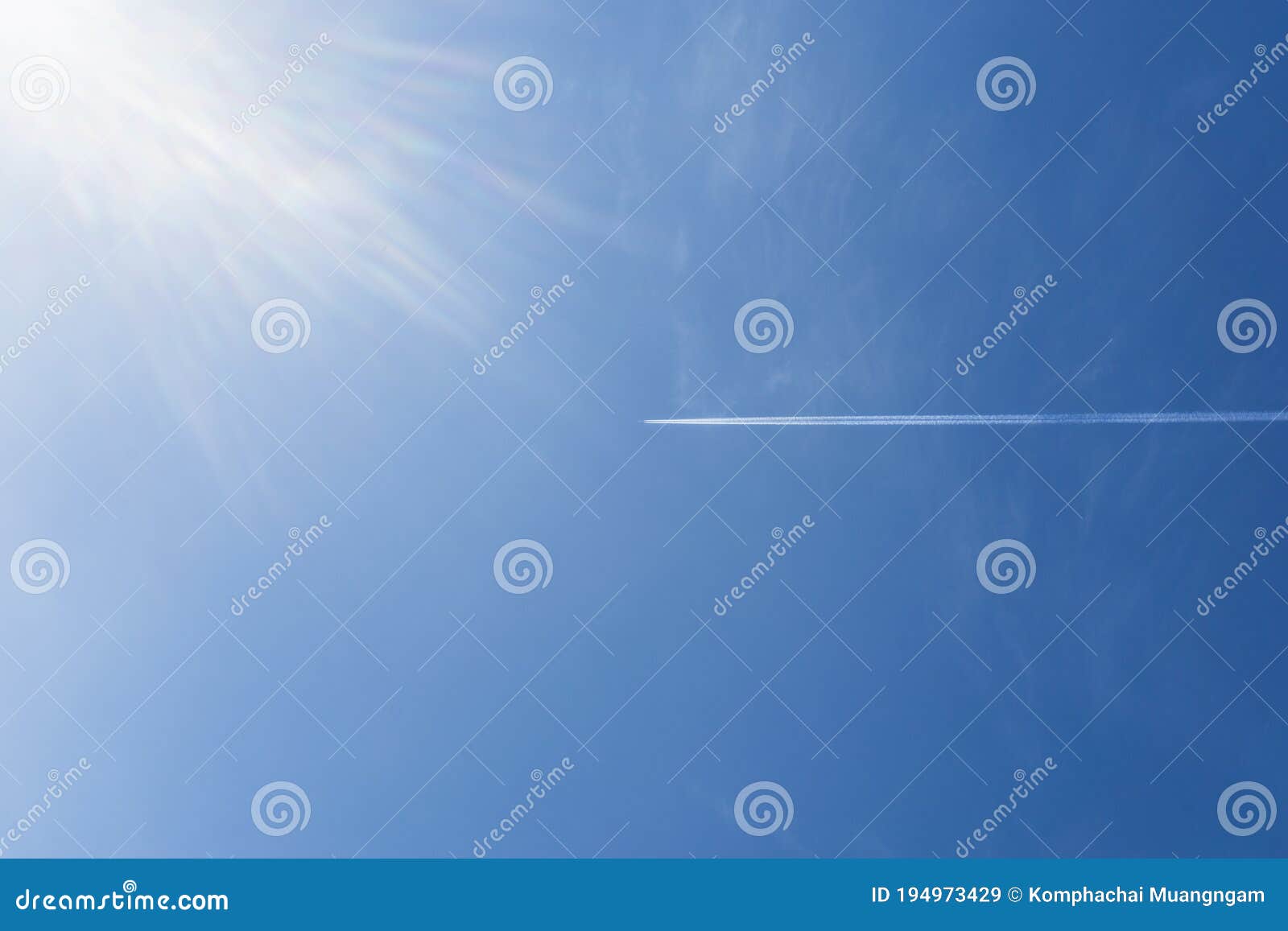 Blue Sky and Light from the Sun and the Faint Shadow of a Plane Flying ...