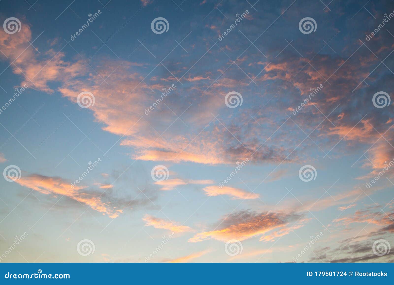 Blue sky with pink clouds stock photo. Image of skyline - 179501724