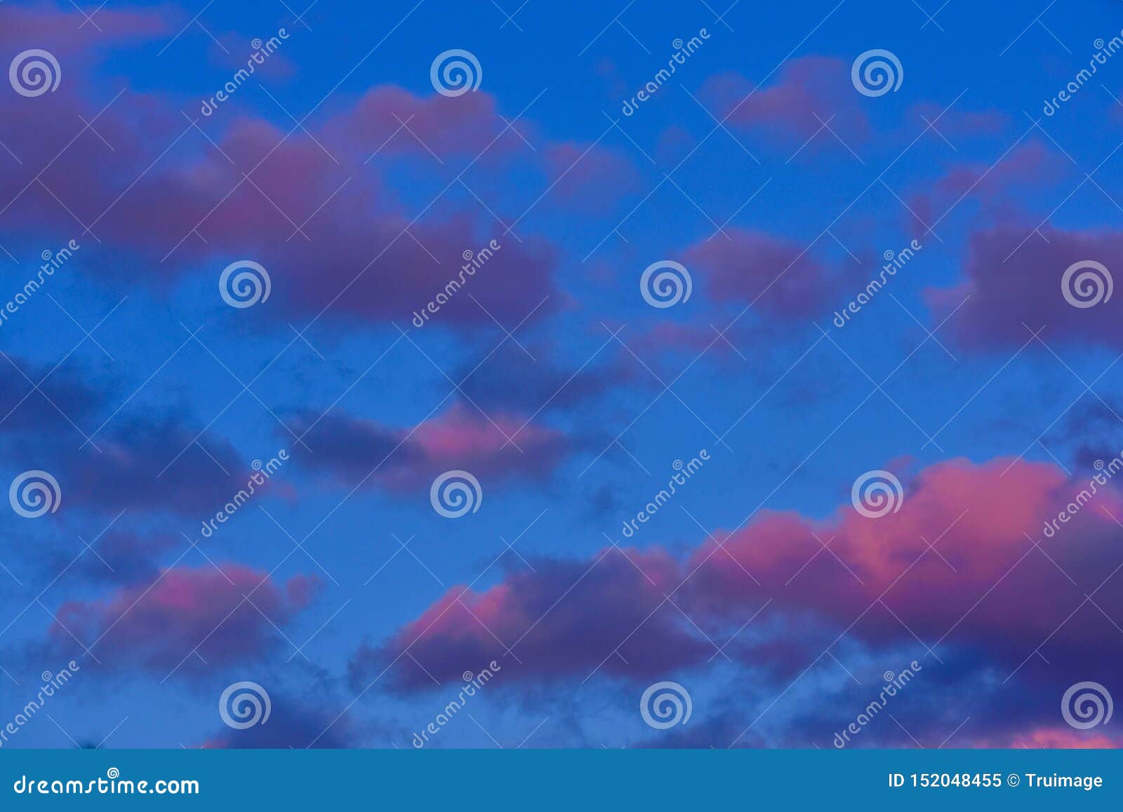 Blue sky and pink clouds stock image. Image of common - 152048455
