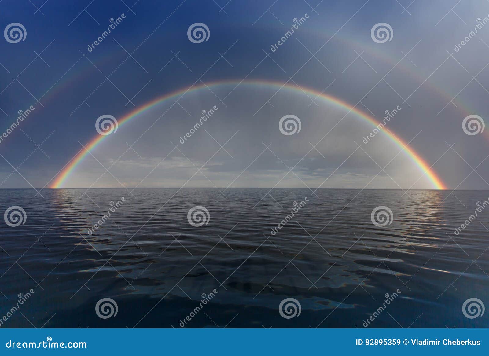 Blue sky and a rainbow stock image. Image of weather - 82895359