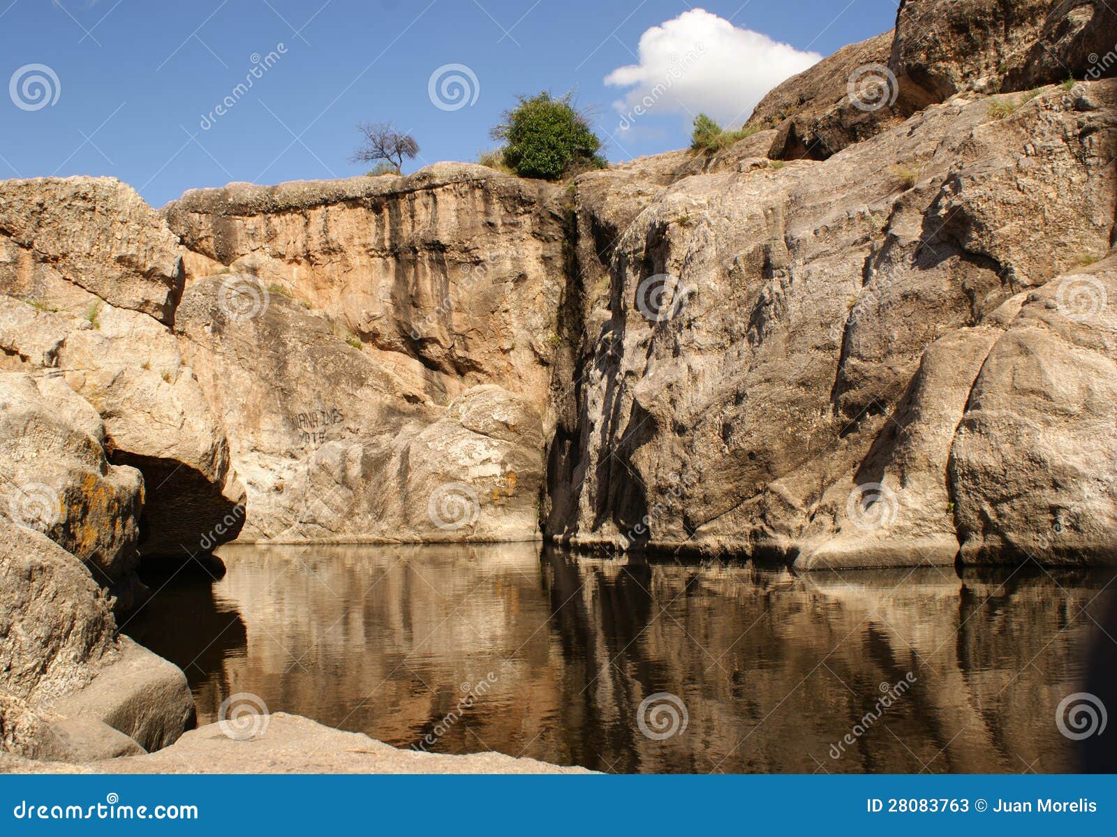 Blue sky and river rocks stock image. Image of blooming - 28083763