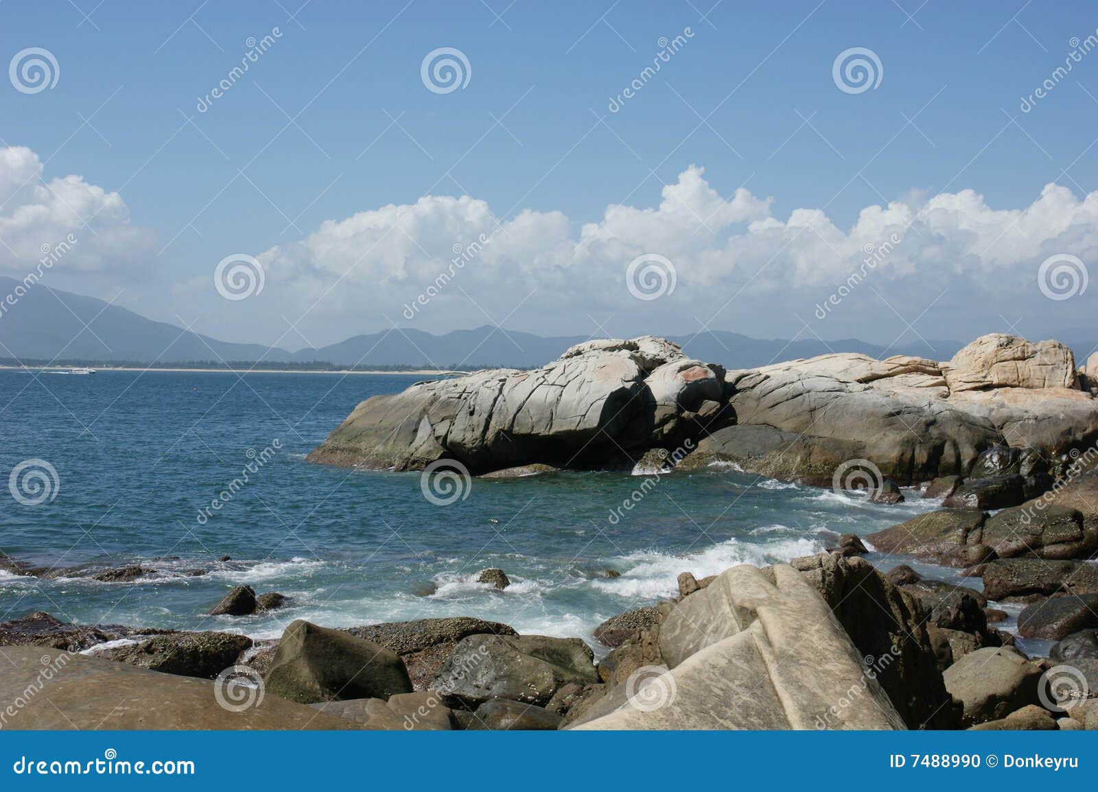 The blue sky and rock bank stock photo. Image of water - 7488990