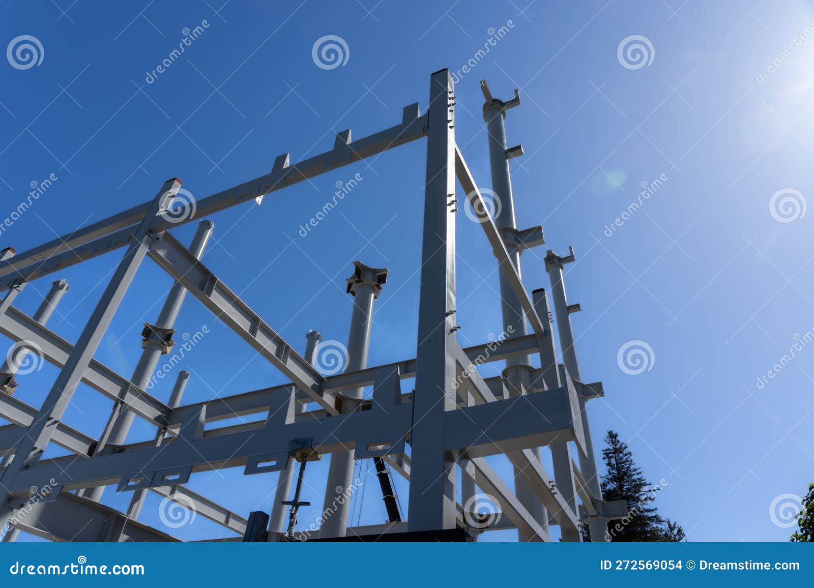 Blue Sky and Sun Over Structural Steel Construction Framing Stock Photo ...