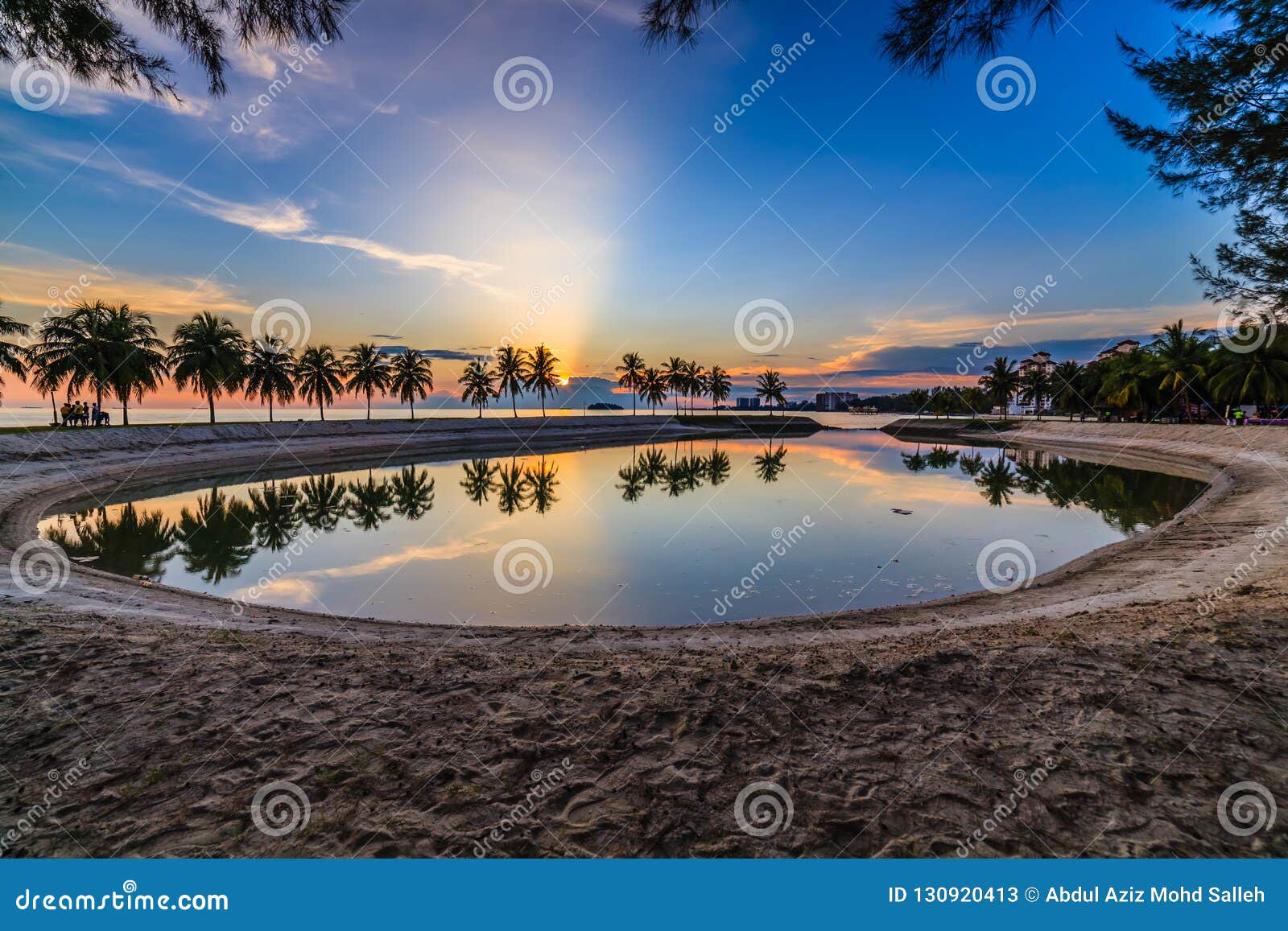 Blue Sky with Sun Rays during Sunset Over the Beach Stock Image - Image ...