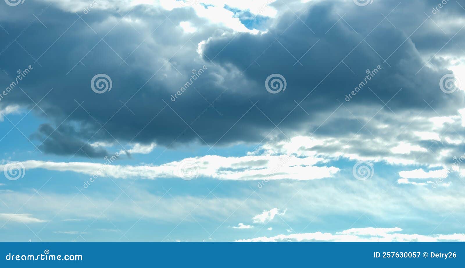 Blue Sky with Thunderclouds. the Sun Breaks through Clouds. Black ...