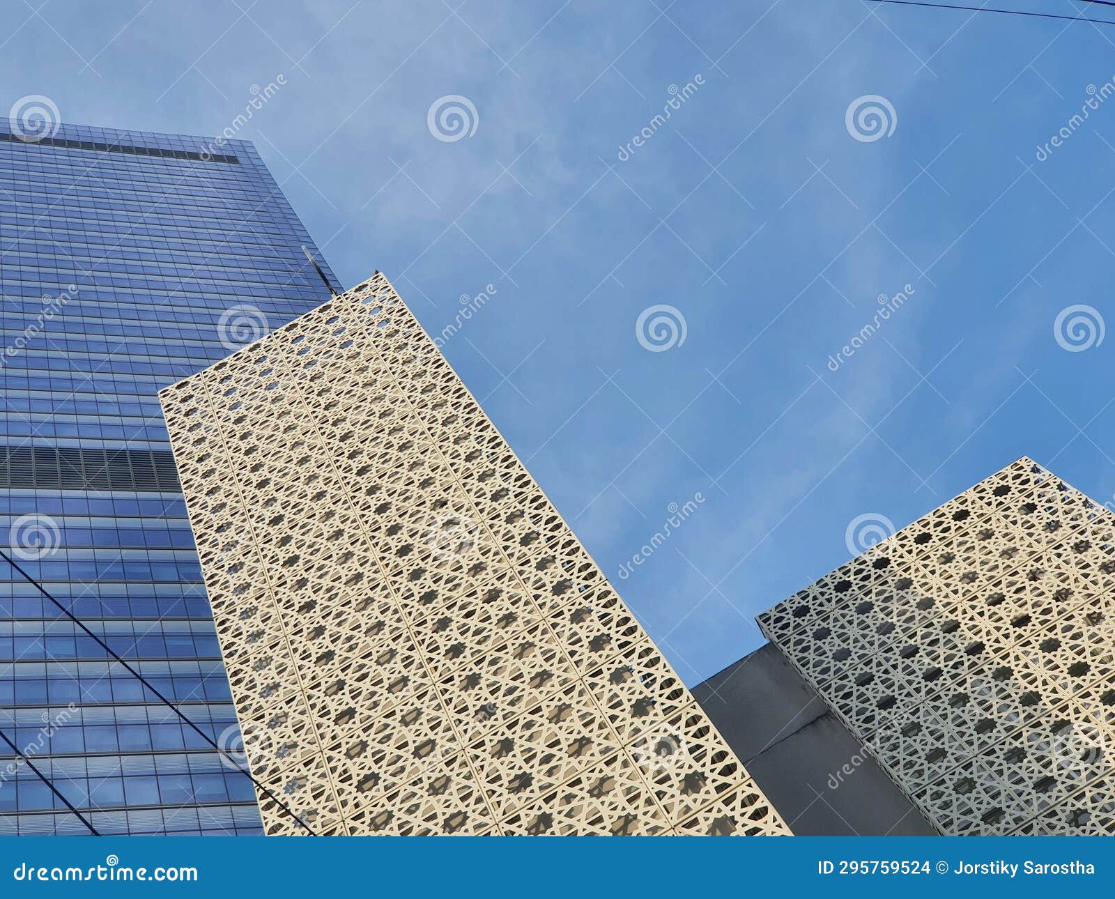 Blue Sky on Top of Tall Buildings with Decorated Outer Wall Stock Photo ...