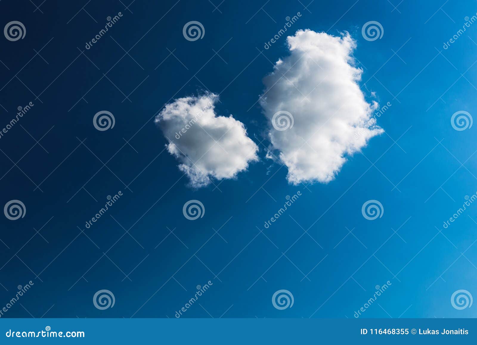 Blue Sky with Two White Clouds Closeup Stock Image - Image of closeup ...
