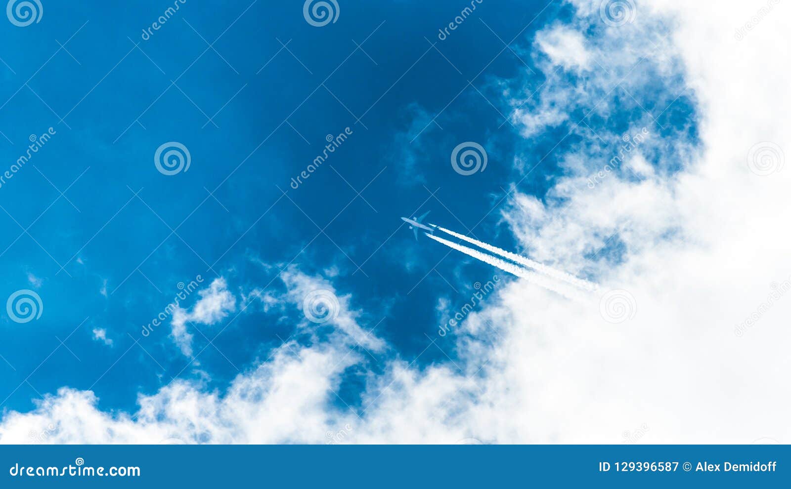 Blue Sky in Which the Plane Flies , Flying Out of the Clouds. Beautiful ...