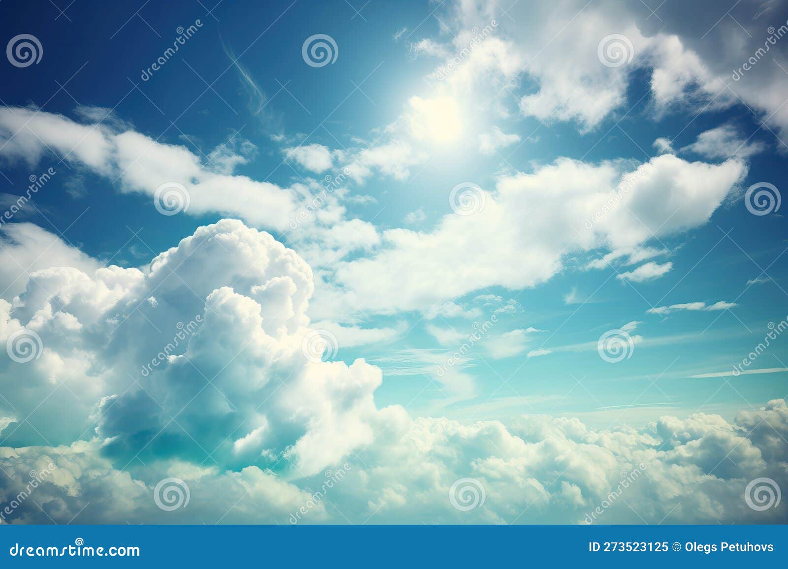 A Blue Sky with White Clouds and a Bright Sun in the Middle of the Sky ...