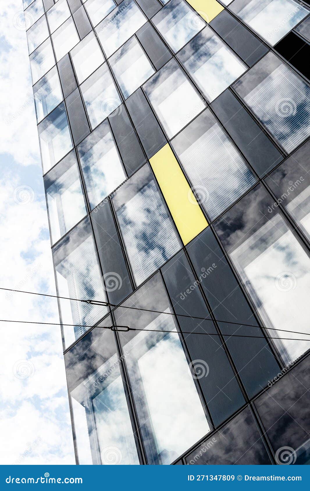 Blue Sky and White Clouds Reflected in the Windows of a High-rise ...