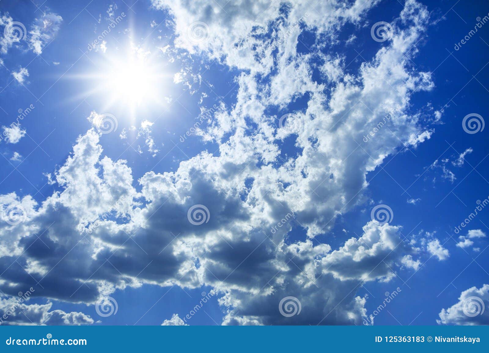 Blue Sky, White Clouds and Sun. Clouds in the Sky with Sharp Light ...