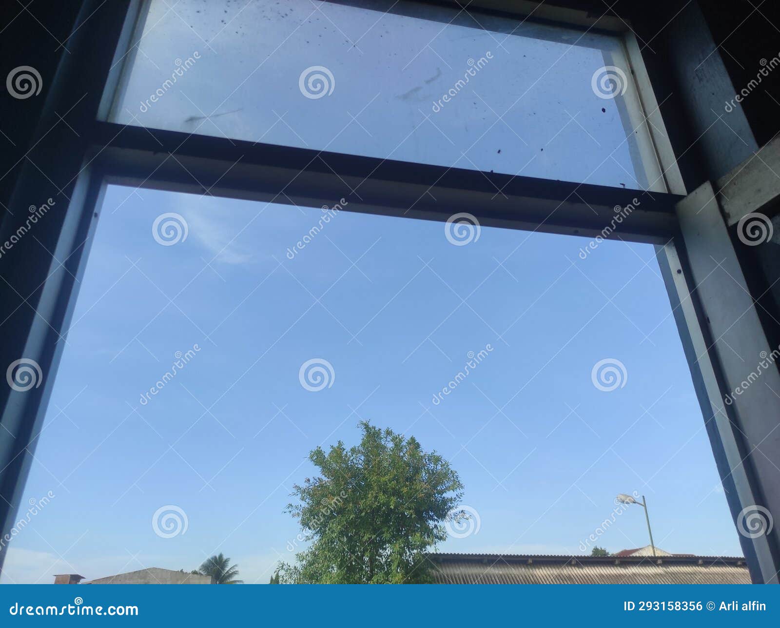 The Blue Sky in Window in Village Stock Photo - Image of window, blue ...