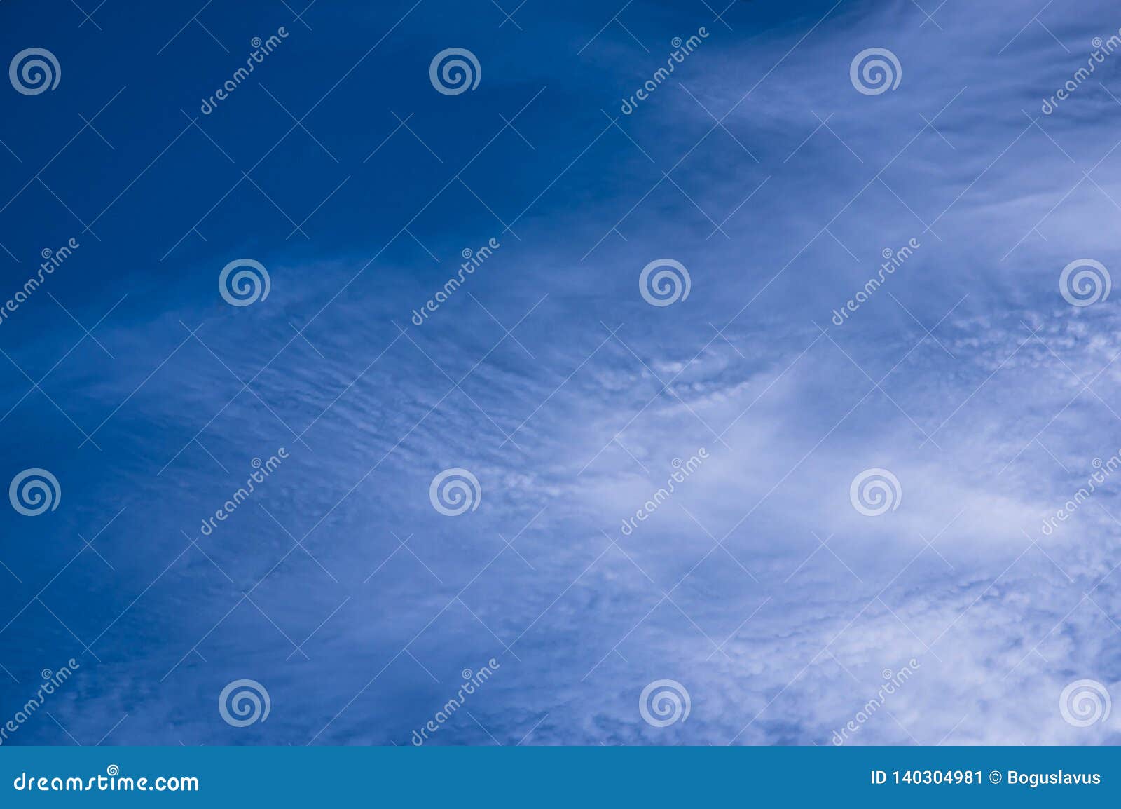 A Blue, Slightly Cloudy Sky. Stock Image - Image of layer, covered ...