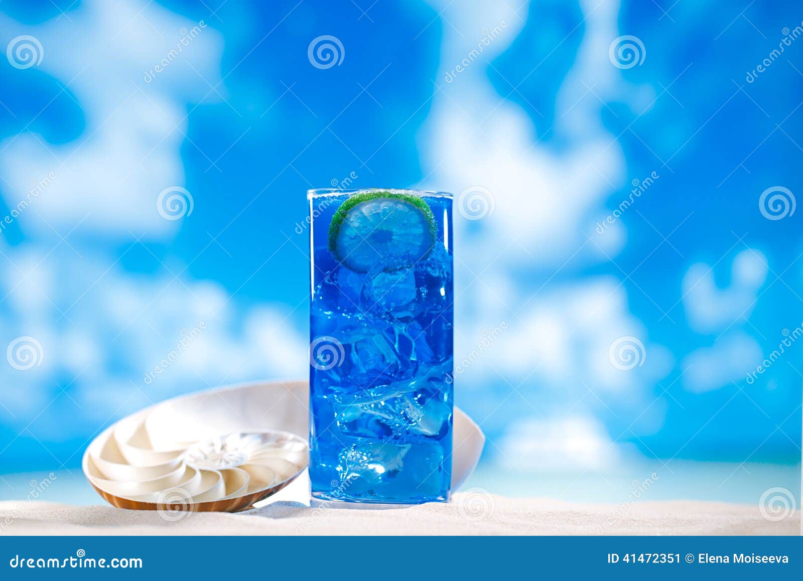Blue Slush Ice in Glass on Sea Beach Background Stock Image - Image of ...