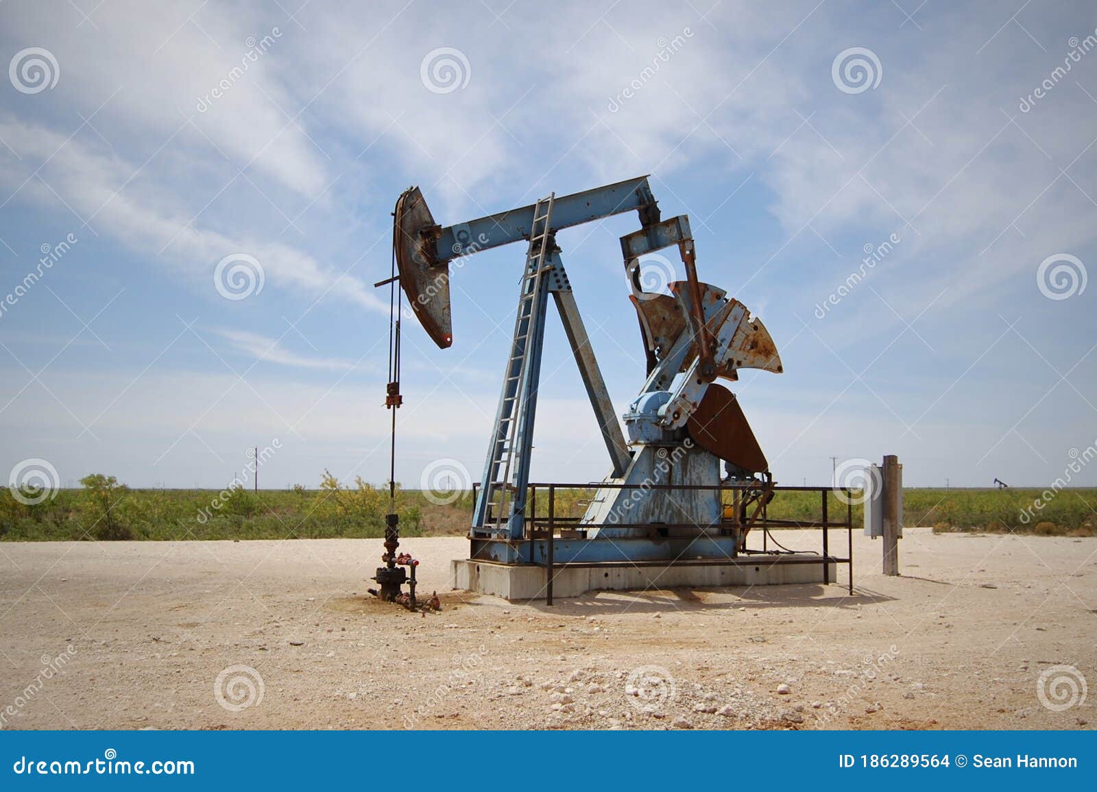 Blue, small pumping unit stock photo. Image of equipment - 186289564