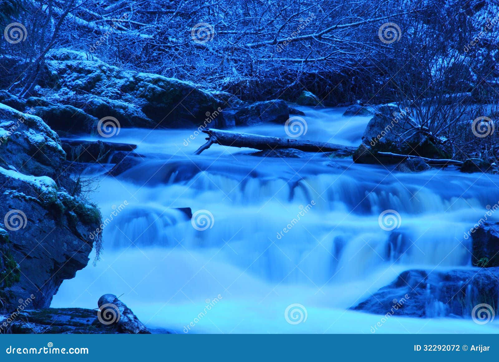 Blue smooth waterfall stock photo. Image of waterfall - 32292072