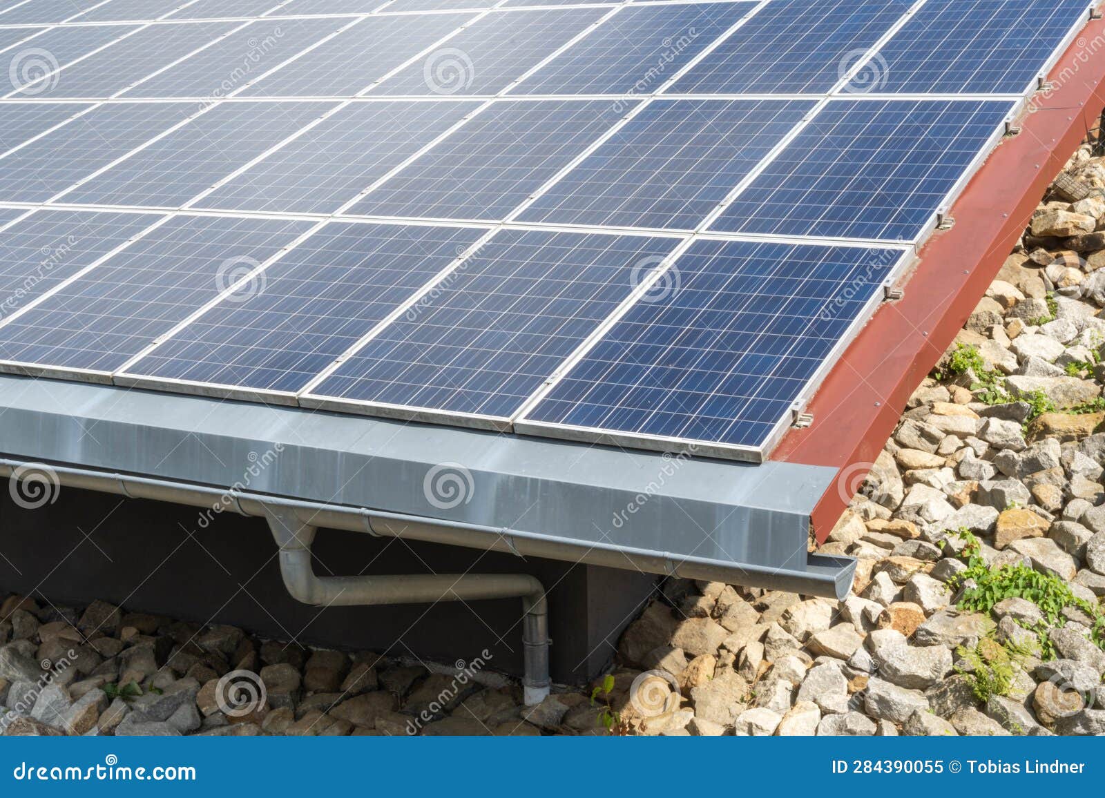 Blue Solar Panels on the Roof, Roof Edge and Gutter Stock Image - Image ...