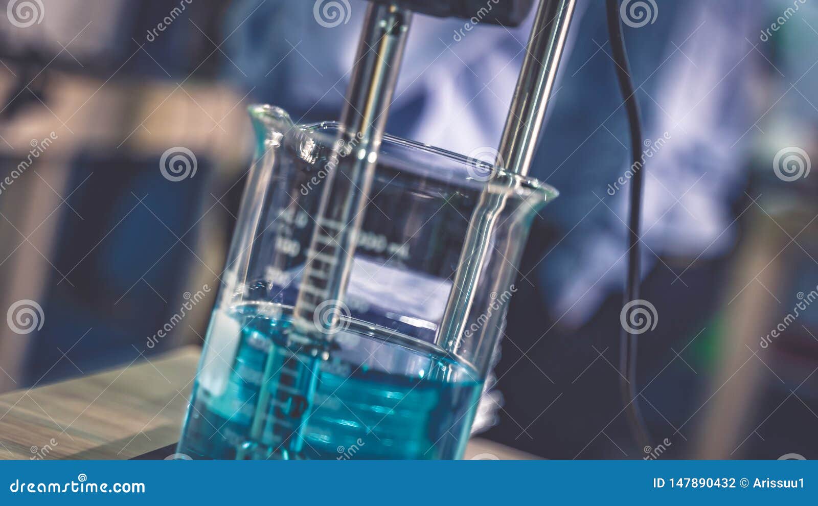 Blue Solution in Glass Beaker Stock Photo - Image of equipment, drop ...