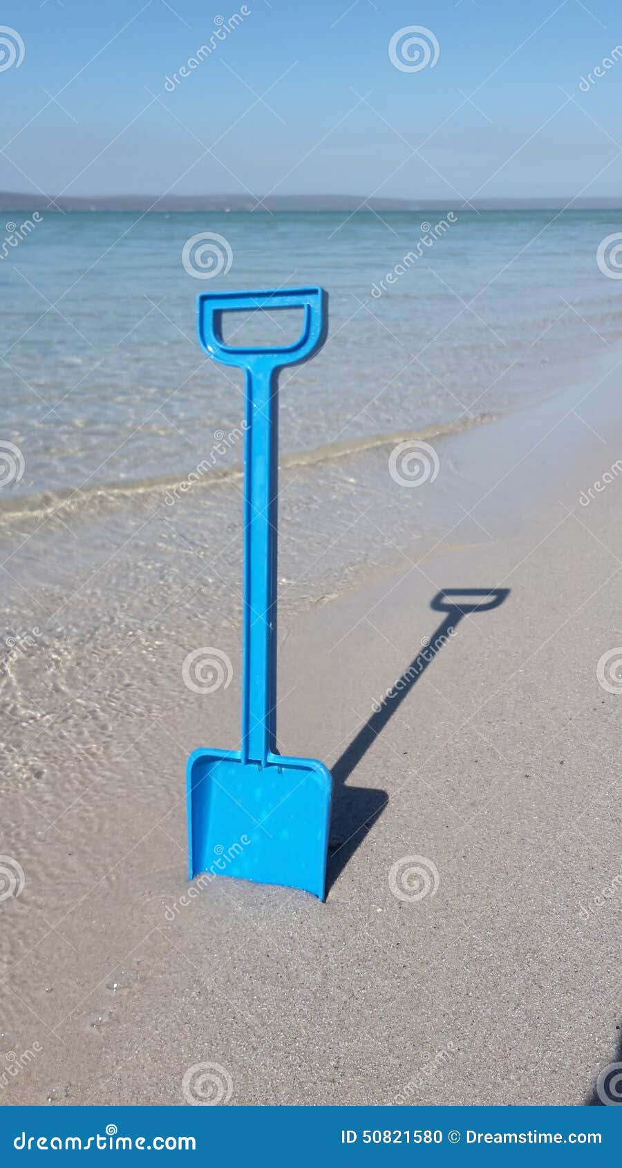 Blue spade and sand stock photo. Image of play, beach - 50821580